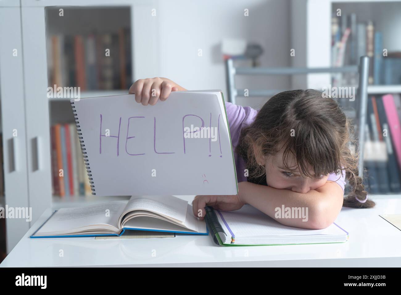 girl studying and asking for help Stock Photo - Alamy