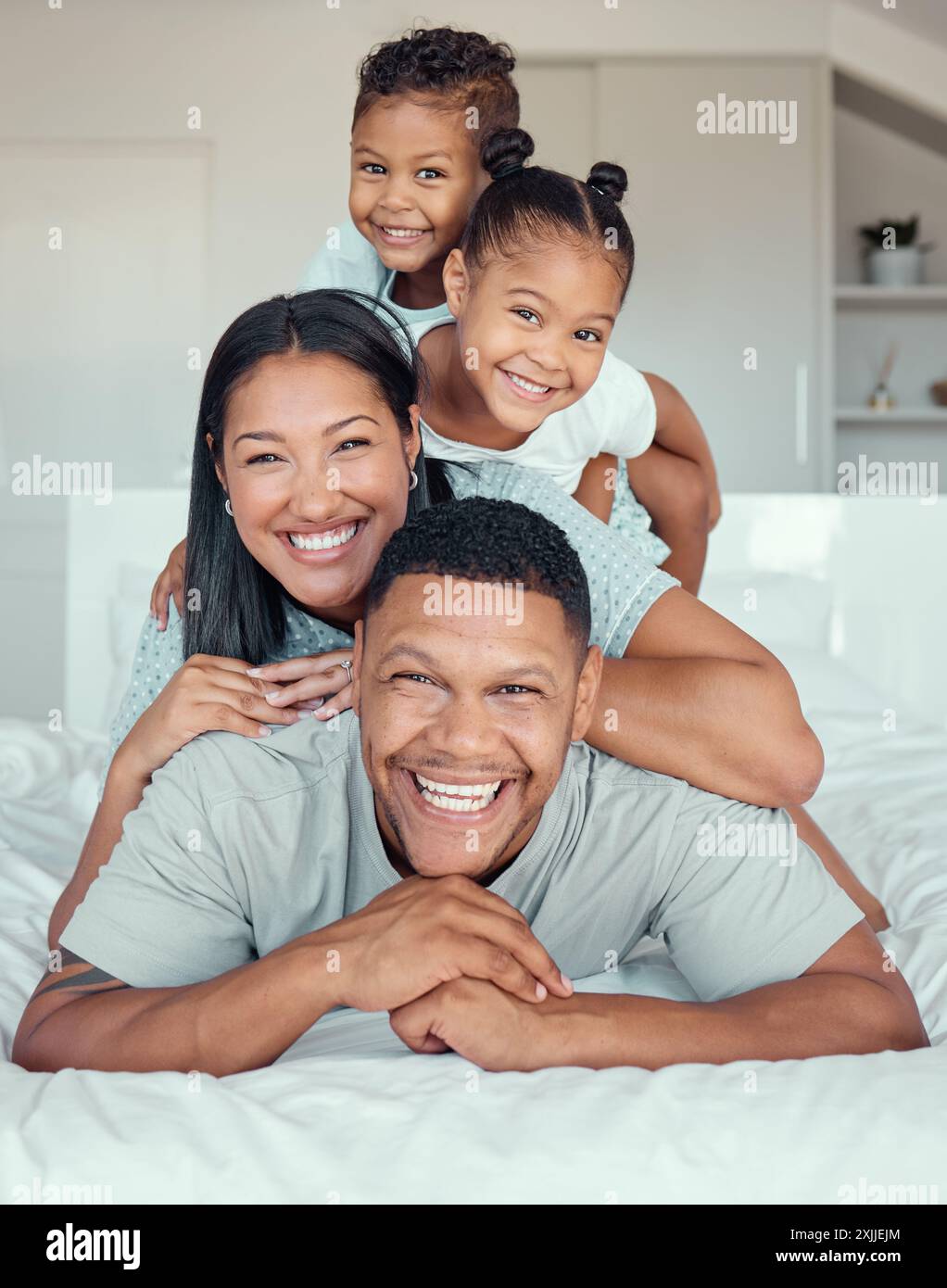 Smile, family pyramid and portrait of children in bedroom for ...