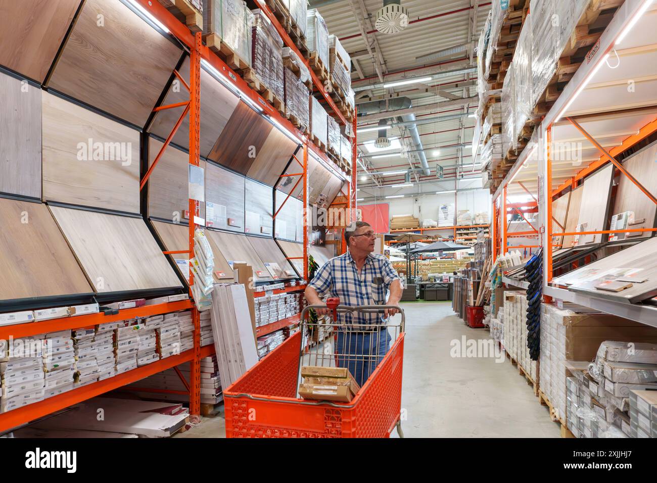 Senior Man Shopping for Flooring Materials at a Hardware Store Stock ...