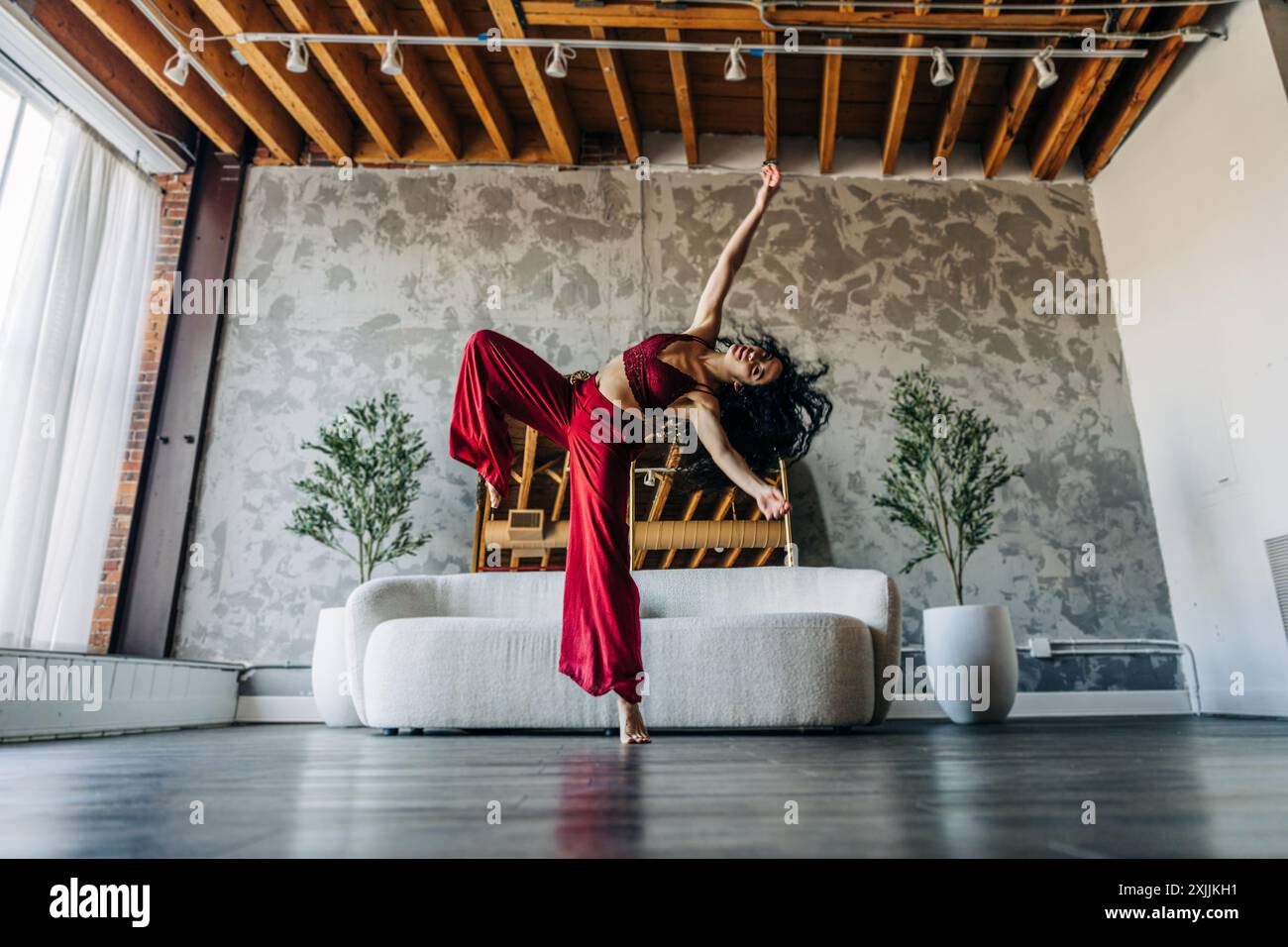 Dynamic joyful woman energetically dancing hi-res stock photography and ...