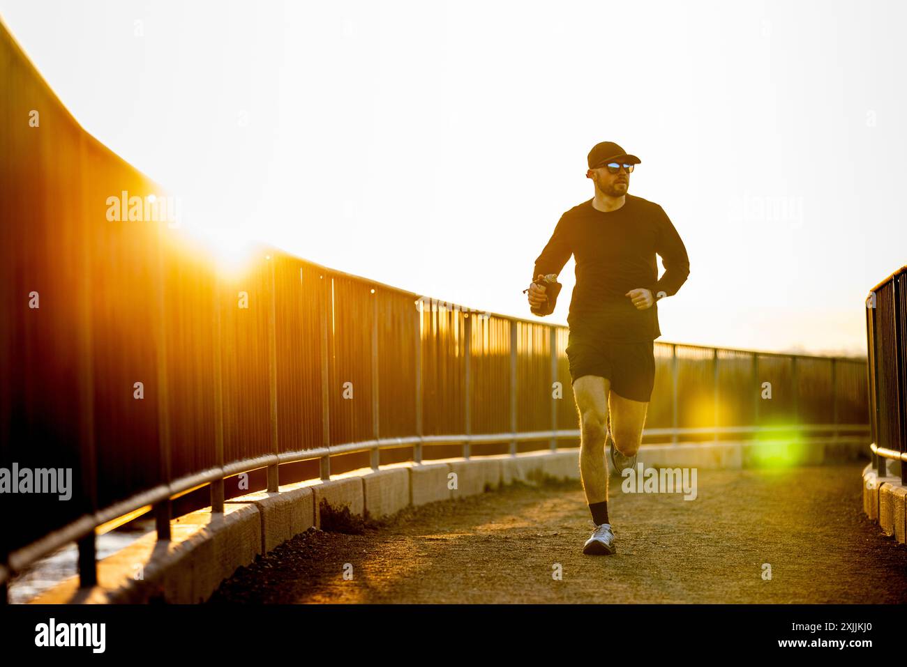 Mid 20s male trail running Stock Photo - Alamy