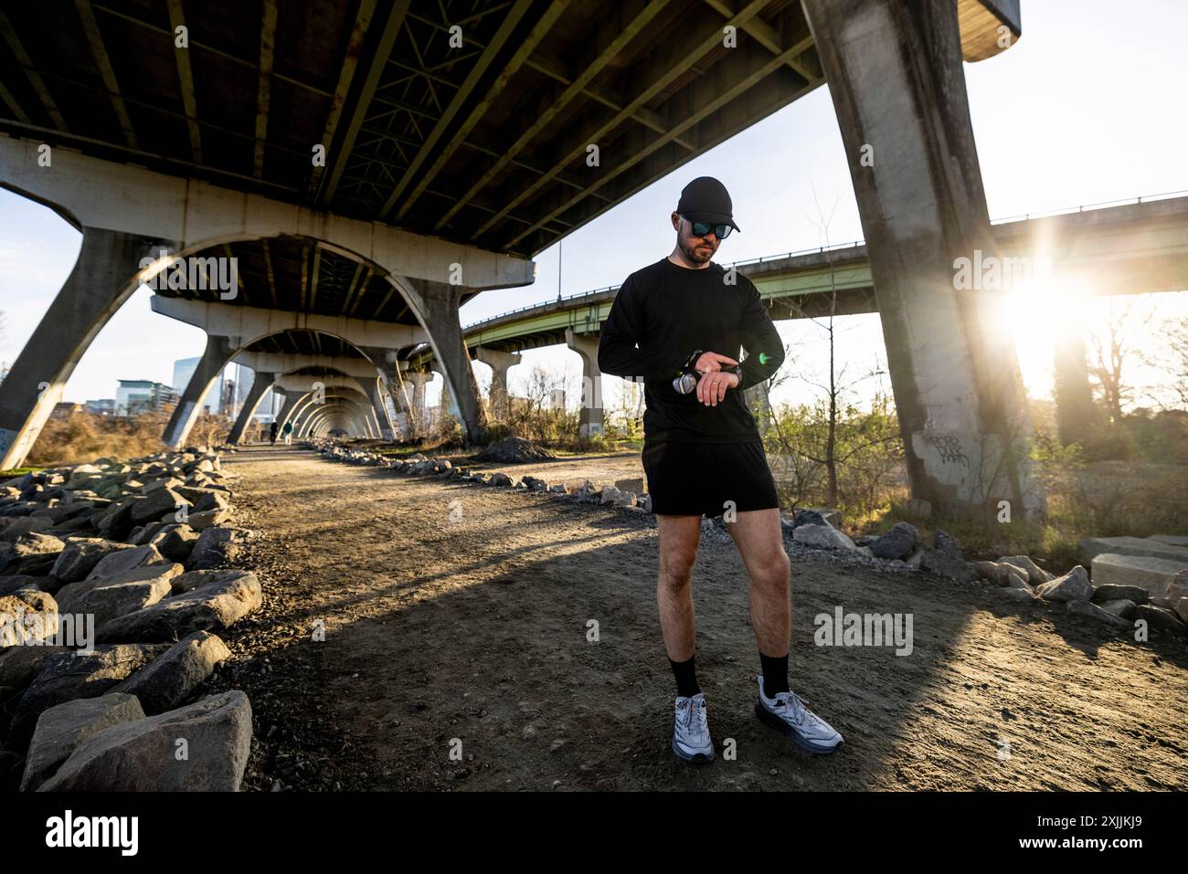 Mid 20s male trail running Stock Photo - Alamy