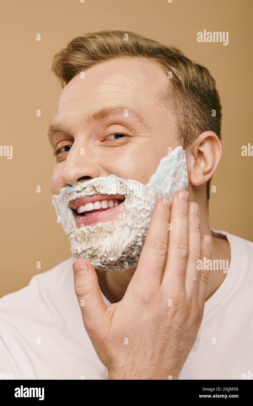 Barber shaves young man close hi-res stock photography and images - Alamy