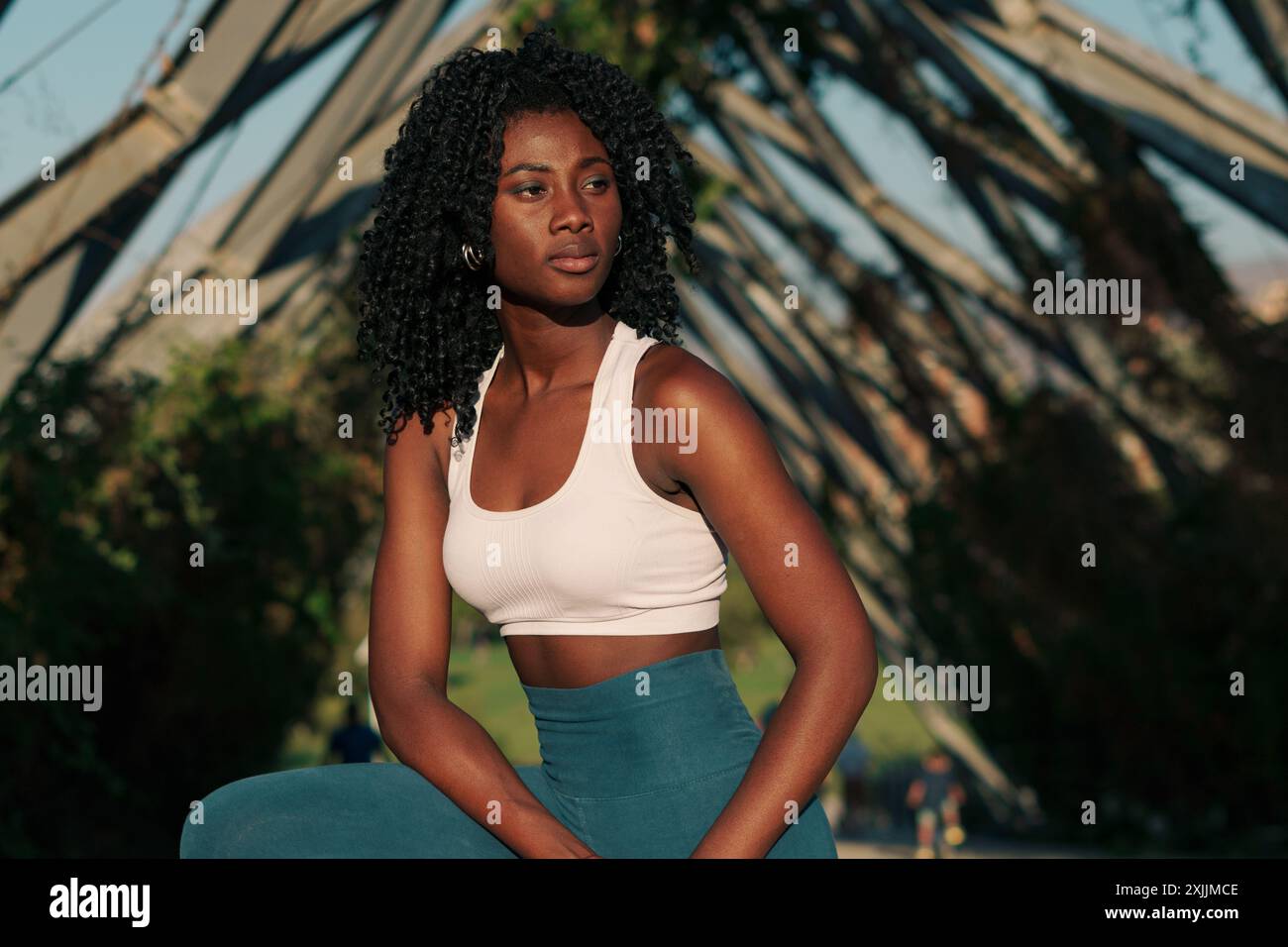 Beautiful black woman breathing, training and exercising outdoors Stock ...