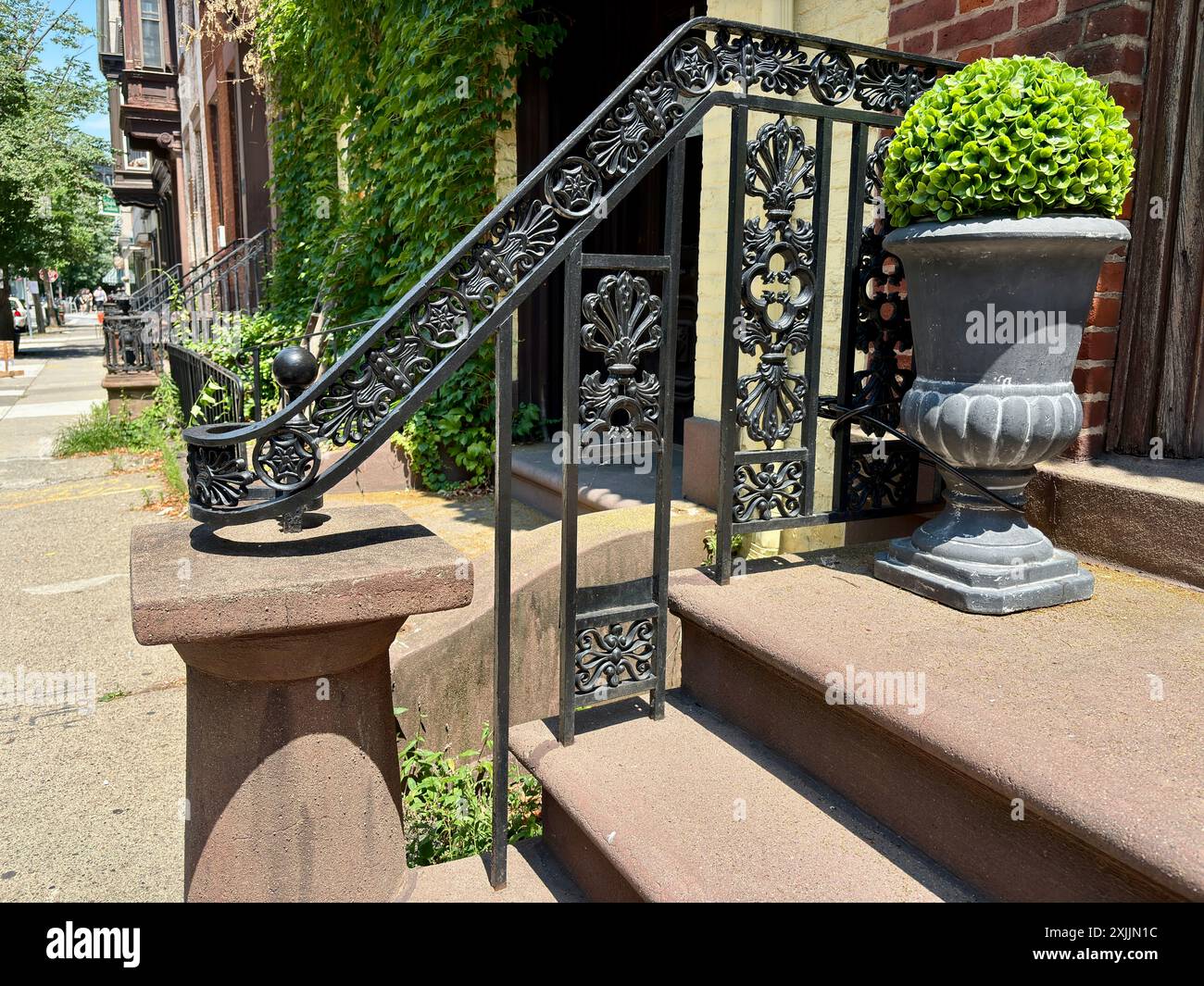 Brick steps and iron railing hi-res stock photography and images - Alamy