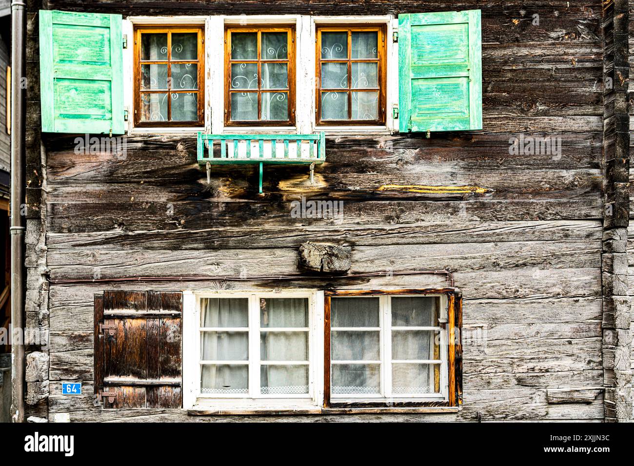 Traditional wood houses in the alpine village of Zermatt Stock Photo ...