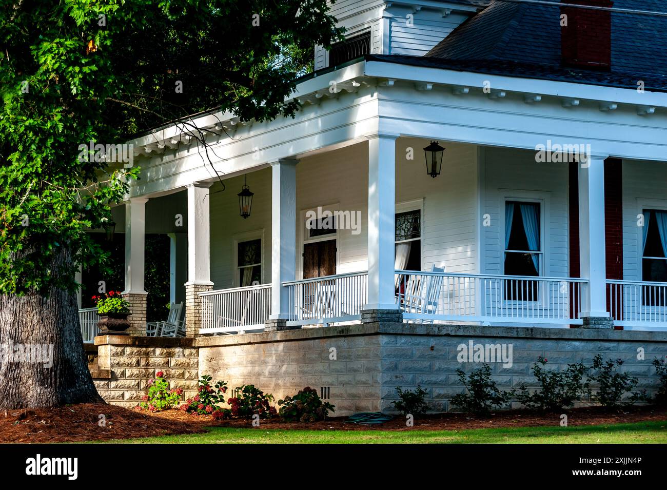 Outside view of an old southern house with big porch Stock Photo - Alamy