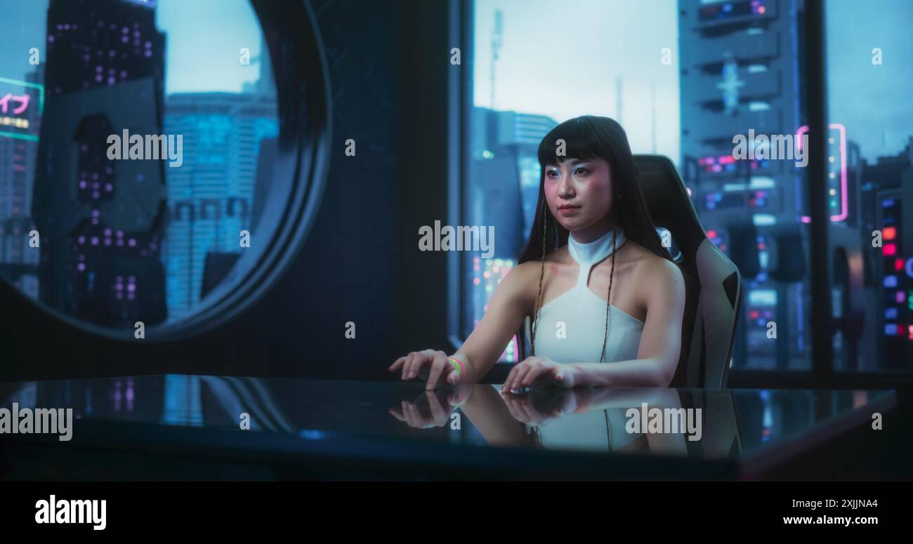 Stylish Japanese Young Woman Interacting with Augmented Reality Platform in a Technologically ...
