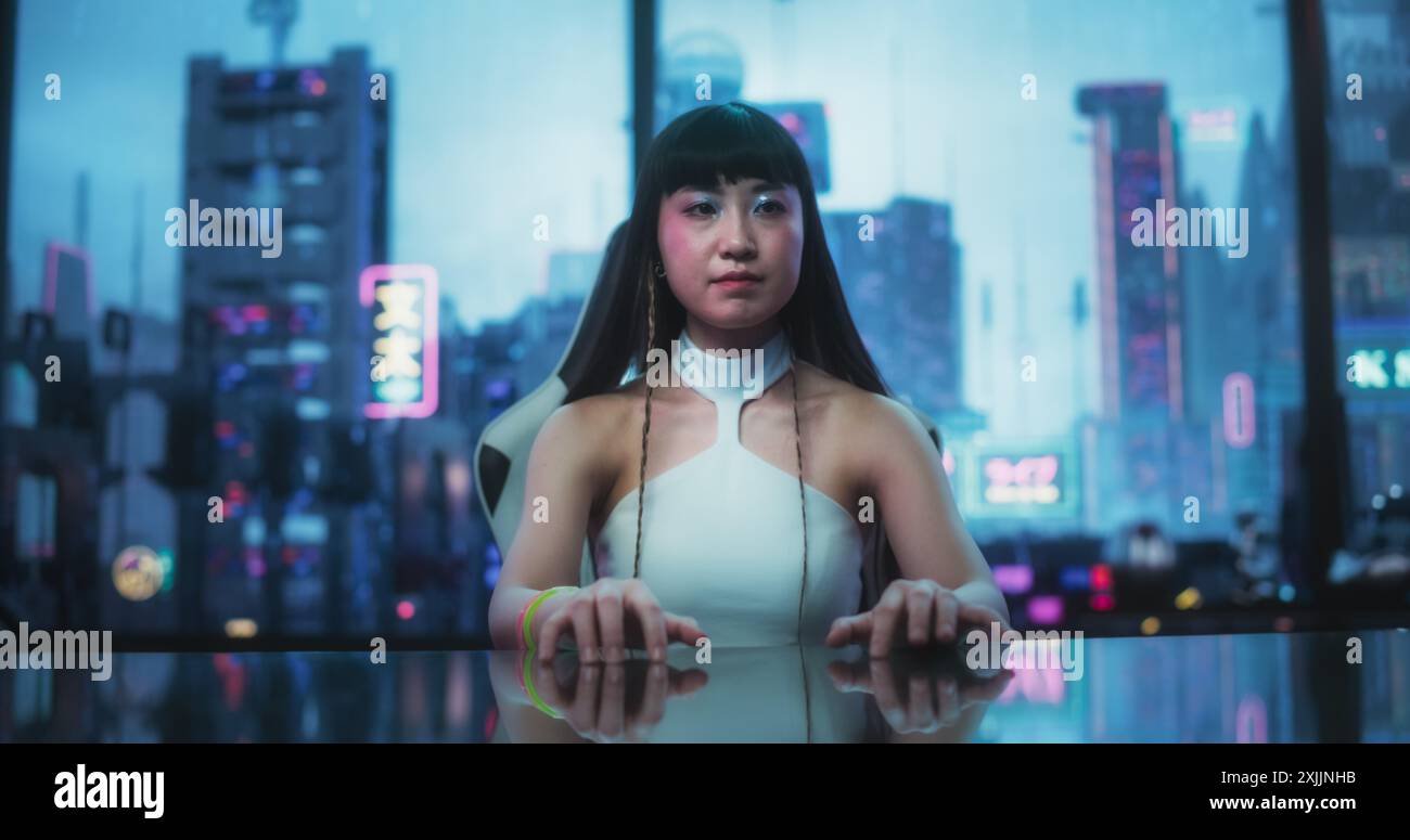 Stylish Japanese Young Woman Interacting with Augmented Reality Platform in a Technologically ...