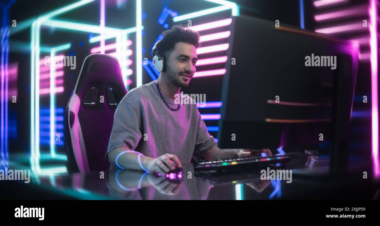 Cinematic Footage of a Young Male Gamer Playing Online Video Game on a ...