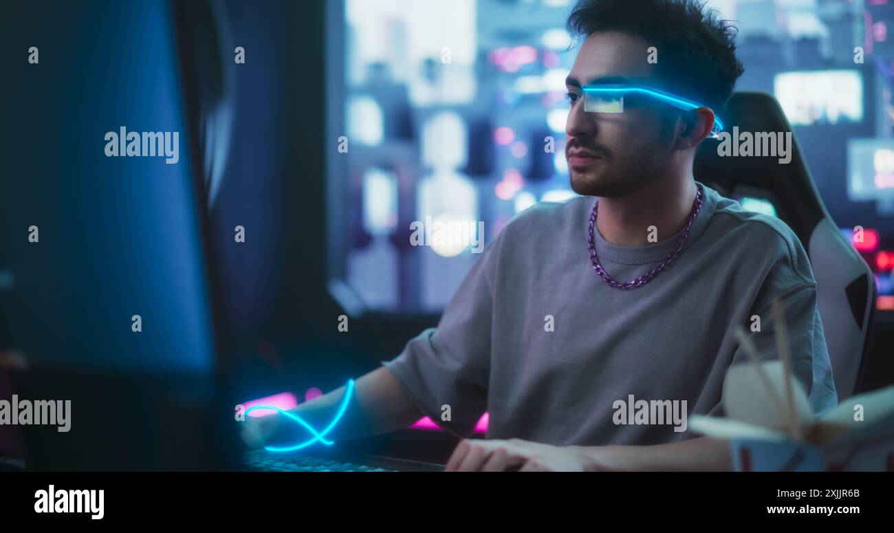 Handsome Influencer Working on Computer in His Stylish Sci-Fi Studio ...
