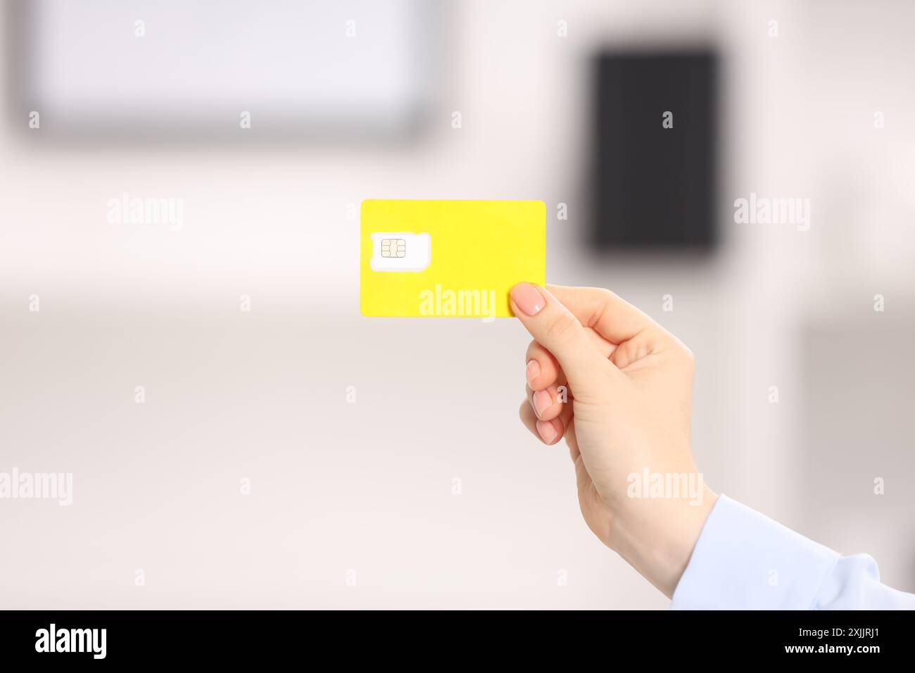 Hand holding sim card hi-res stock photography and images - Alamy
