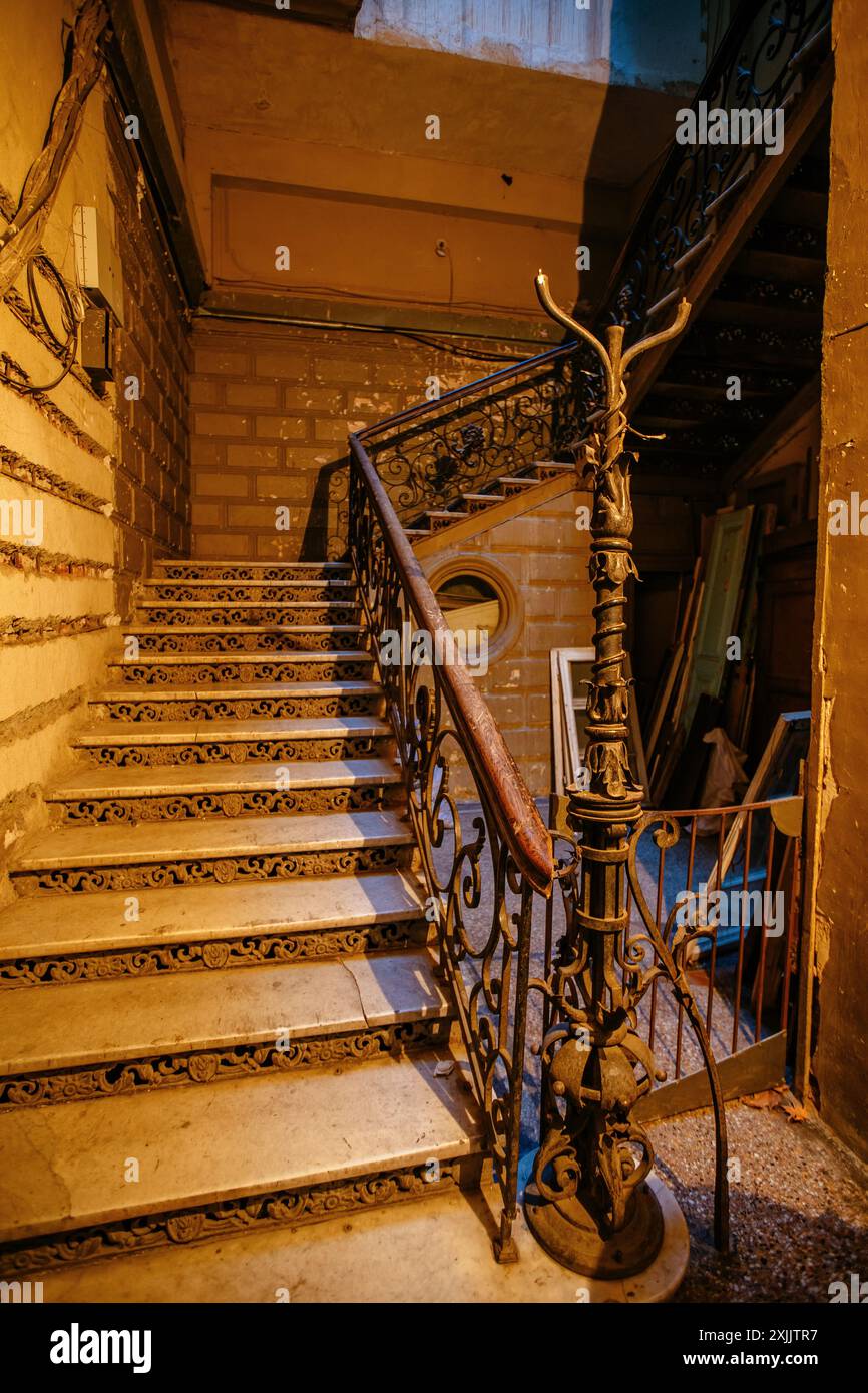 Vintage forged cast iron spiral staircase at the old mansion Stock ...