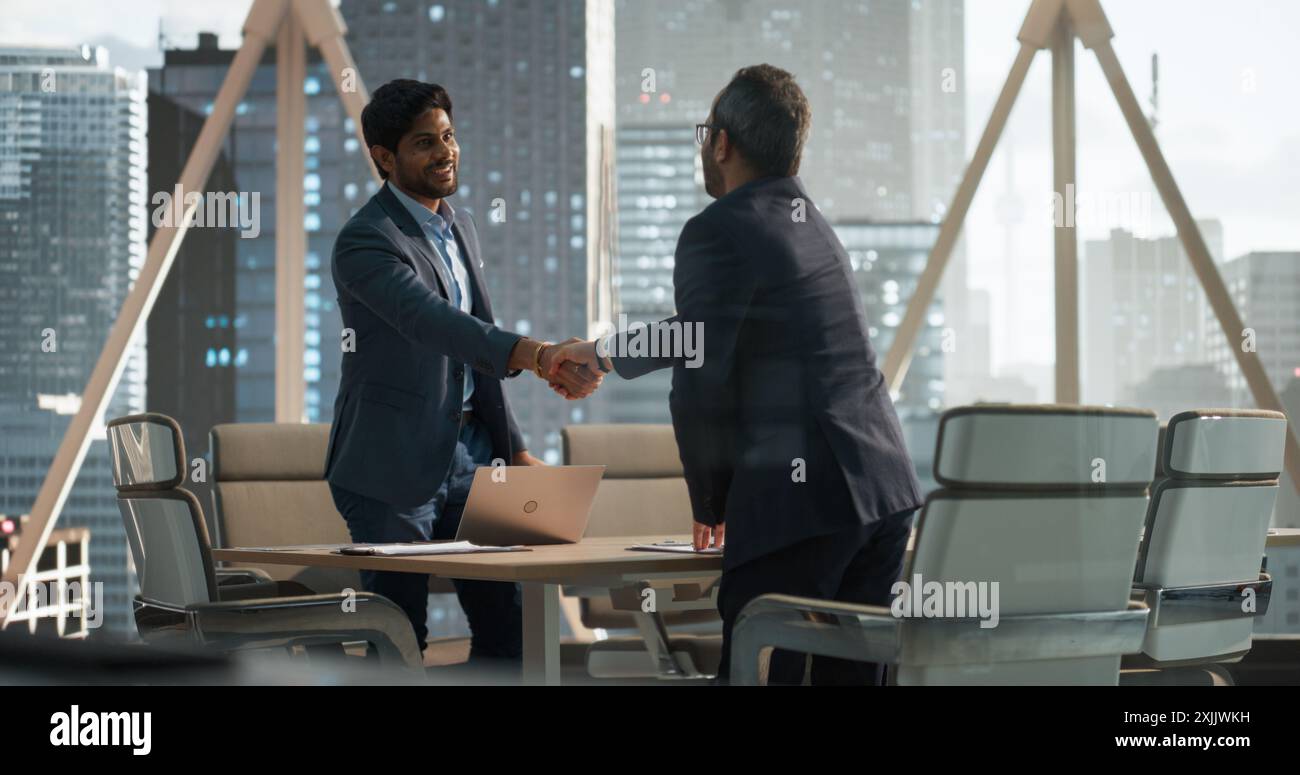 South Asians Business Partners Striking a Successful Deal at a ...