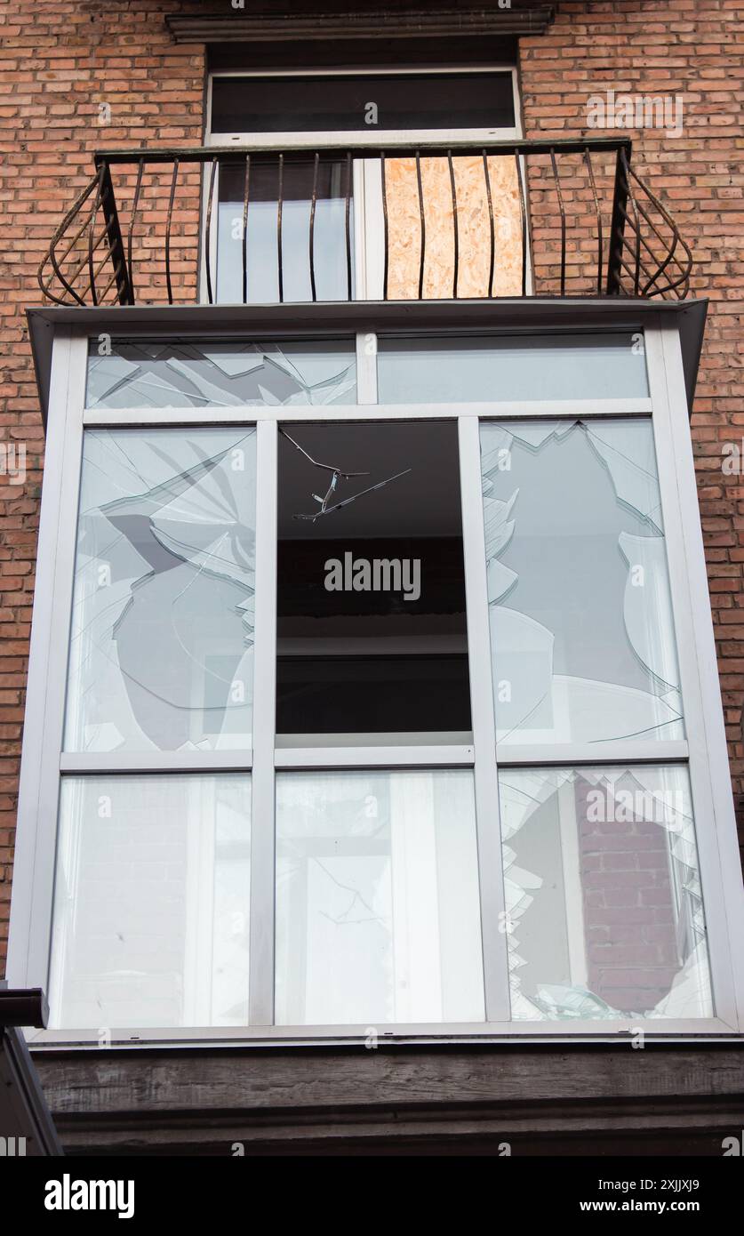 Balcony with broken windows after missile attack on Ukraine. Russian ...