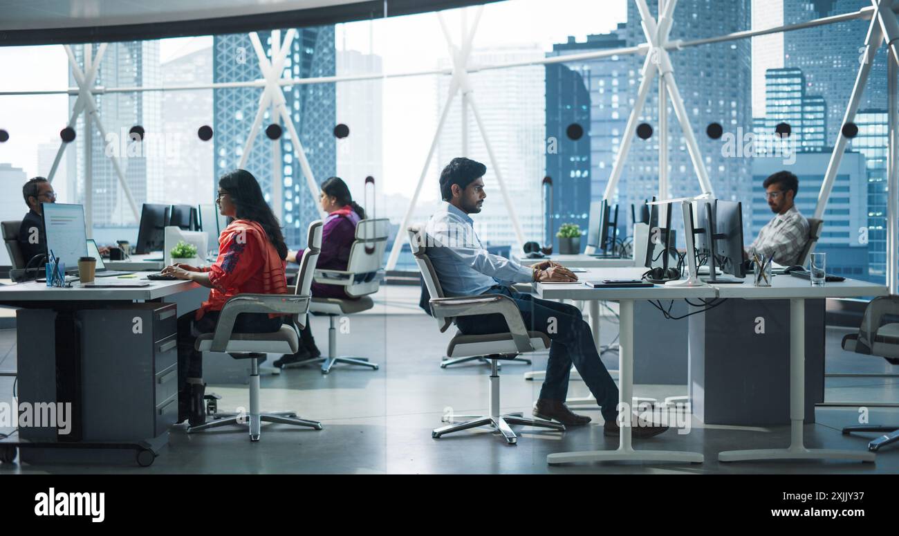 Team of Talented Young Indian Professionals Working in a Business Research and Development ...