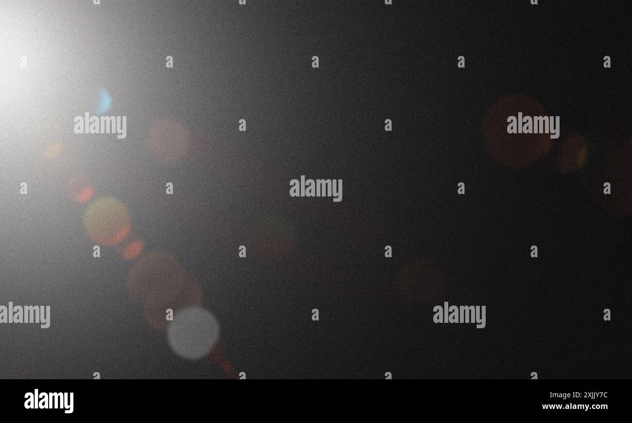 Bokeh effect and light flares on a textured background, ideal for use ...