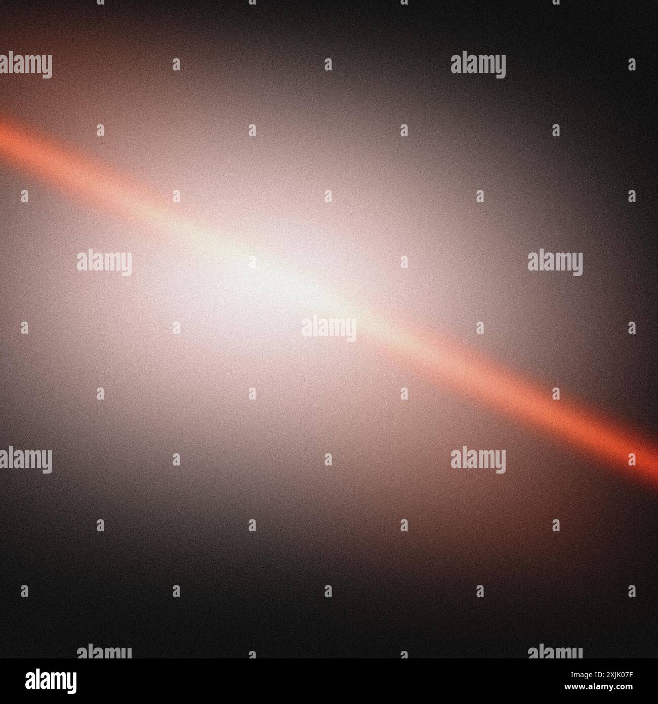 Abstract background created by a red light beam crossing a textured ...