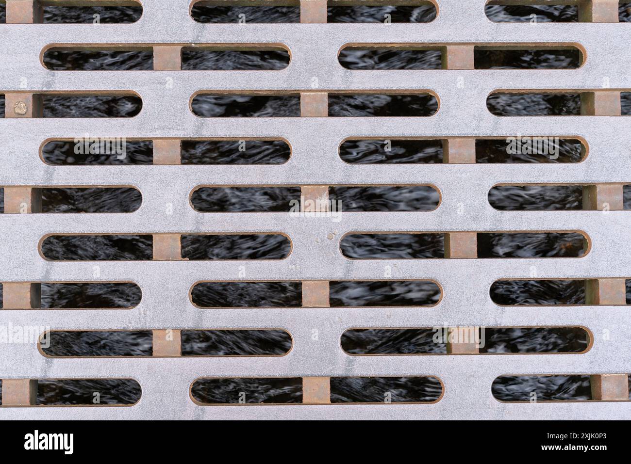 Manhole over flowing water hi-res stock photography and images - Alamy