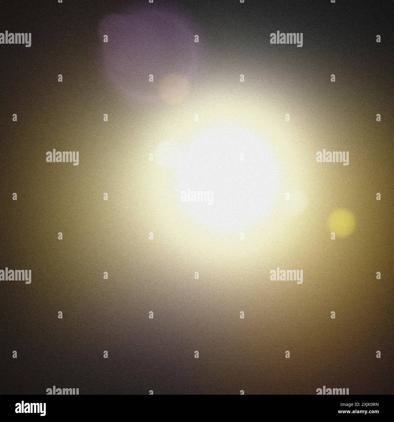 Bright light shining on a grainy texture background Stock Photo - Alamy