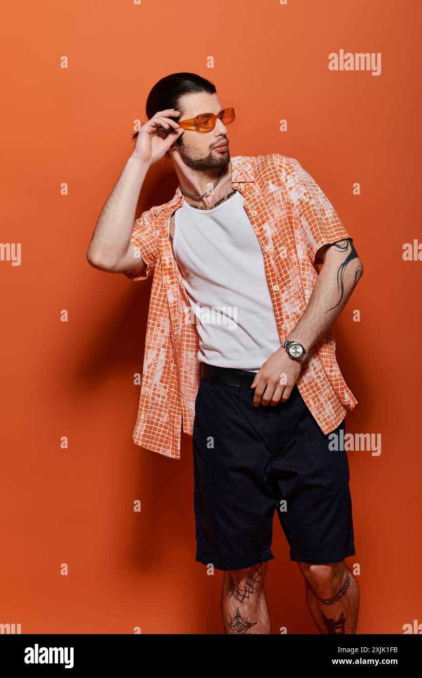 Man, posing, watch hi-res stock photography and images - Alamy