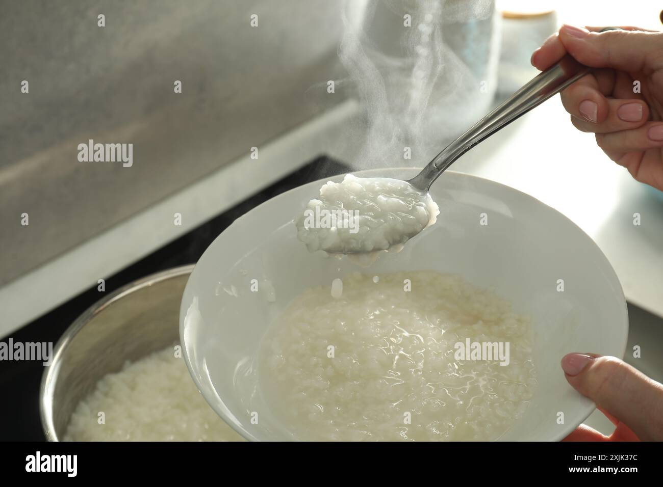 Asian woman putting tasty hi-res stock photography and images - Alamy