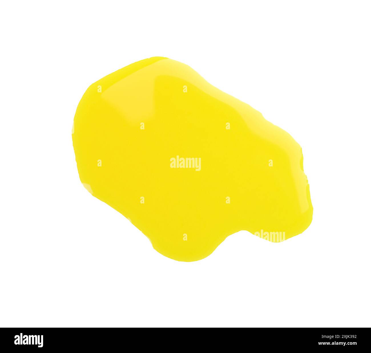 Blot of yellow printer ink isolated on white Stock Photo - Alamy