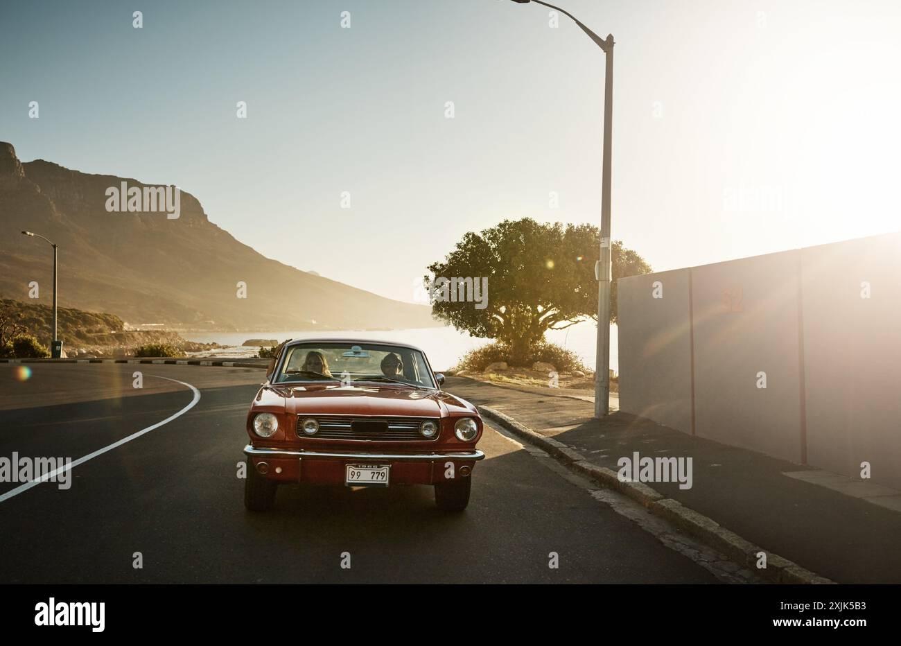 Car, driving and couple on journey, holiday or vacation together with ...