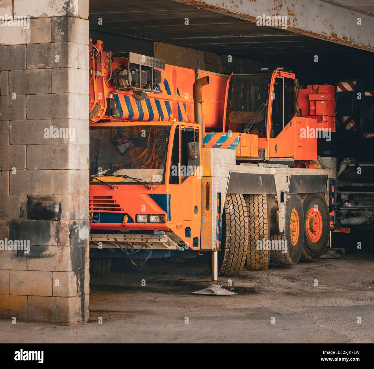 Orange construction crane hi-res stock photography and images - Alamy