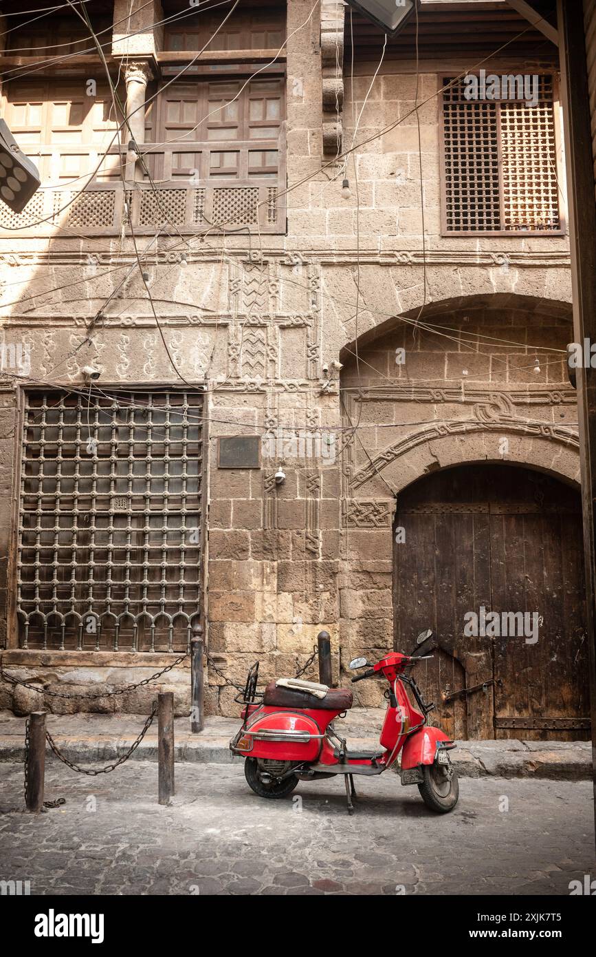 Cairo, Egypt. 07th July, 2024. A cool-looking red scooter parked in ...
