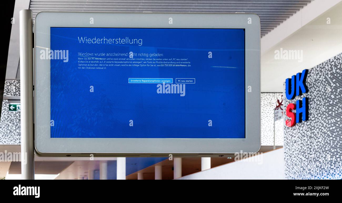 19 July 2024, International, Lübeck: An electronic information board in the main building of the ...