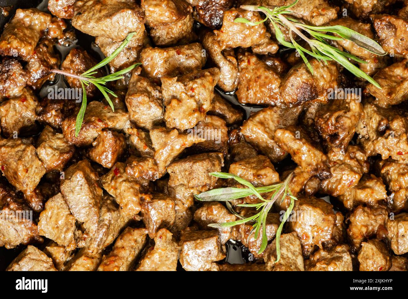 Cooked Fried liver in pan on rustic background, giblets food Stock ...