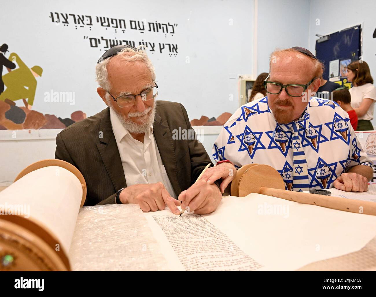 Rabbi Akiva Garber, the Jerusalem Scribe, writes the last 120 letters ...
