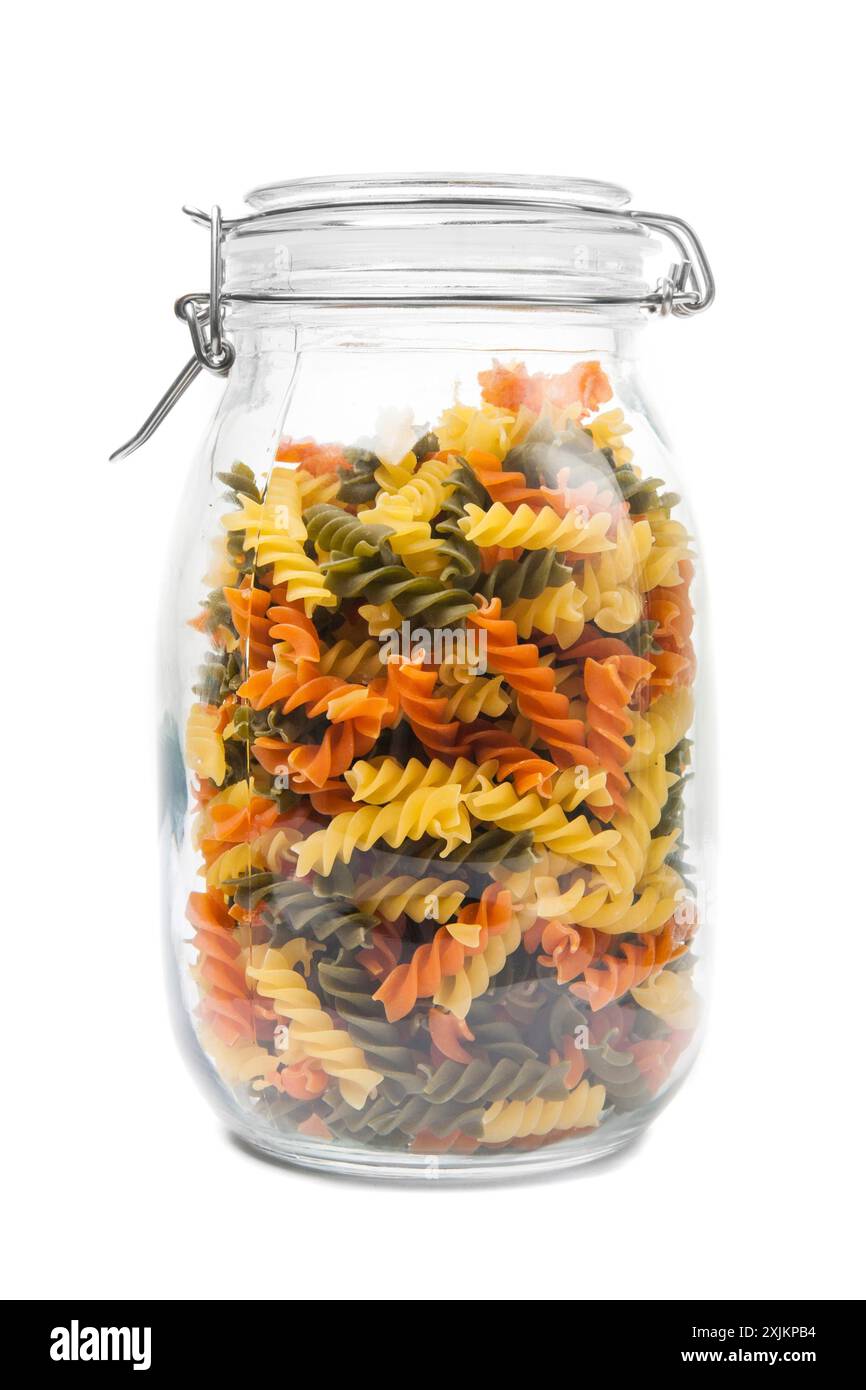 Pasta in a jar. Isolated on white background Stock Photo - Alamy