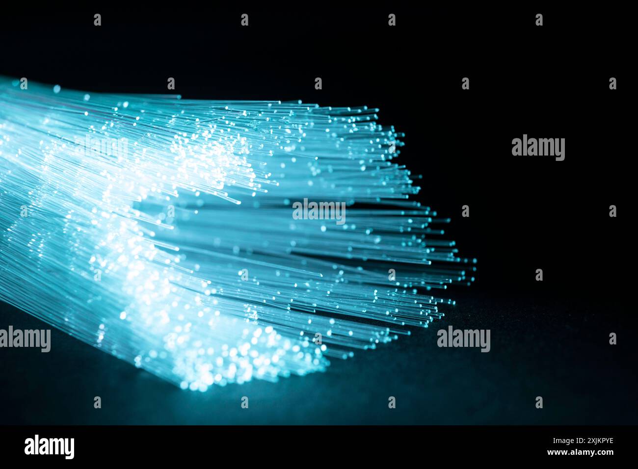 Blue luminous optic fiber Stock Photo - Alamy