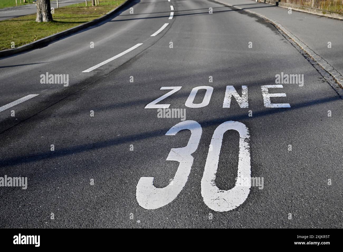 Ground markings 30 km/h Stock Photo - Alamy