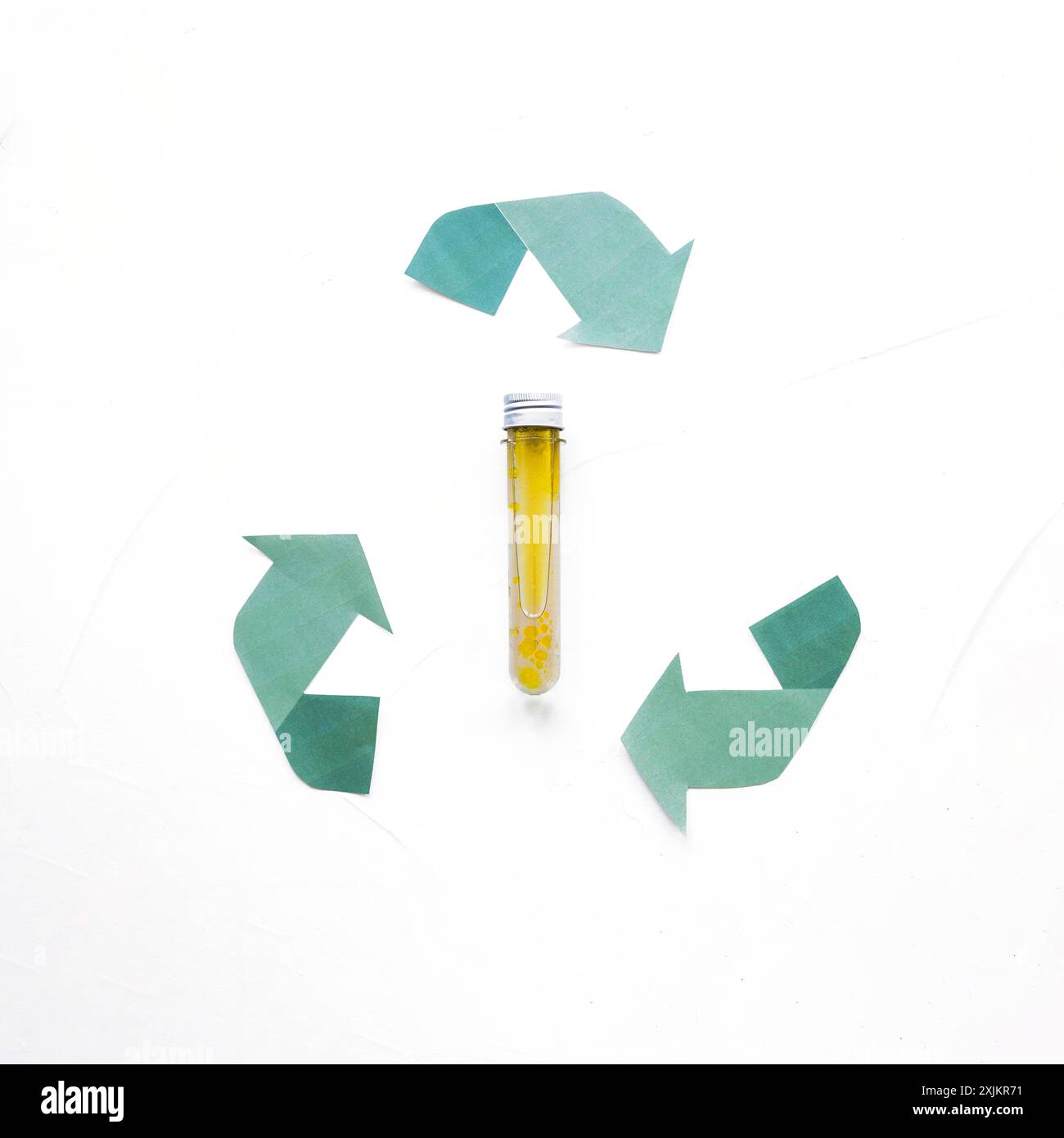 Recycle logo with oil capsule Stock Photo - Alamy