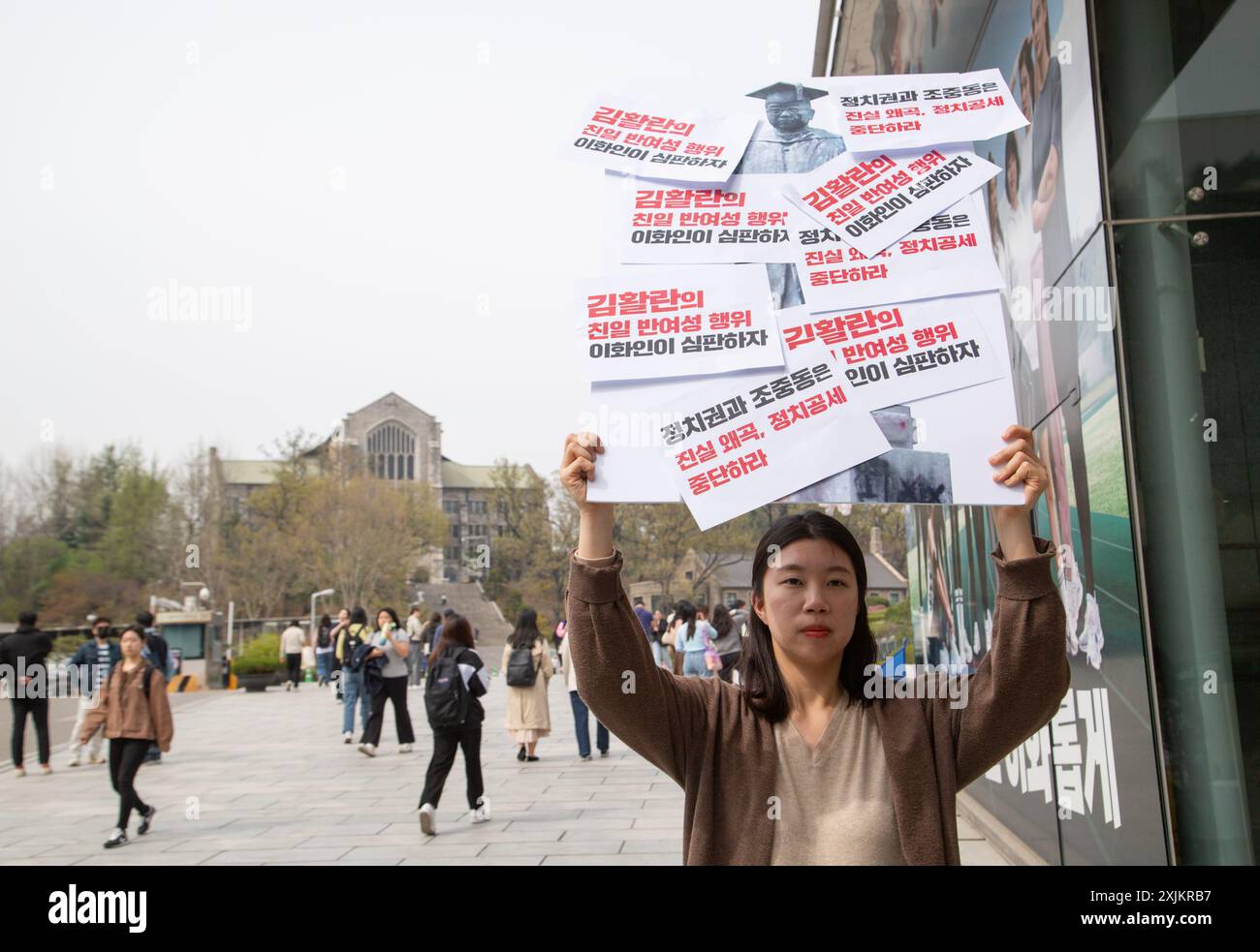 Protest against Kim Hwal-Lan, April 8, 2024 : A participant holds a ...