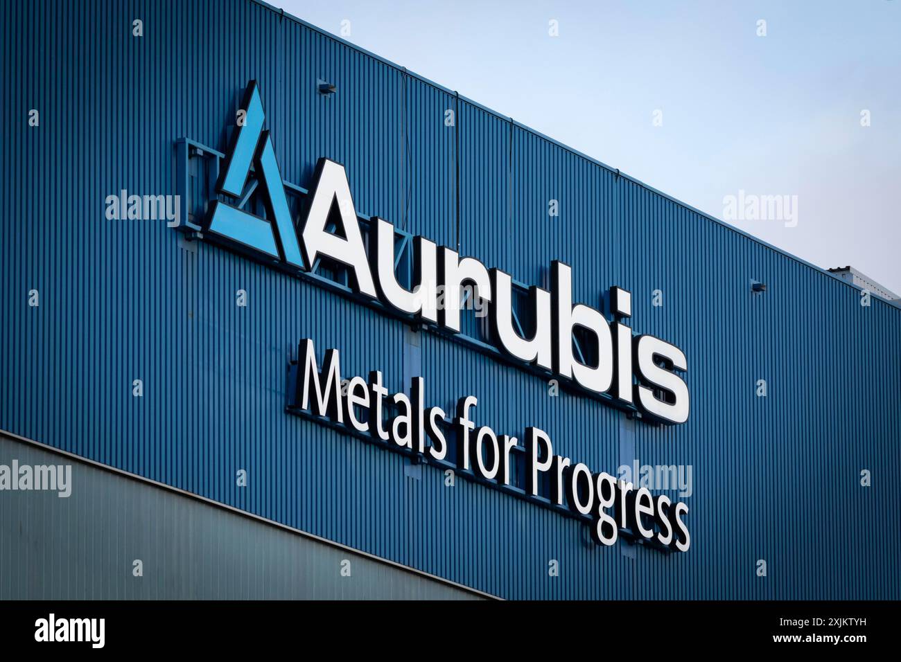 Logo and lettering Aurubis Metal for Progress on a factory building at the Aurubis AG plant ...