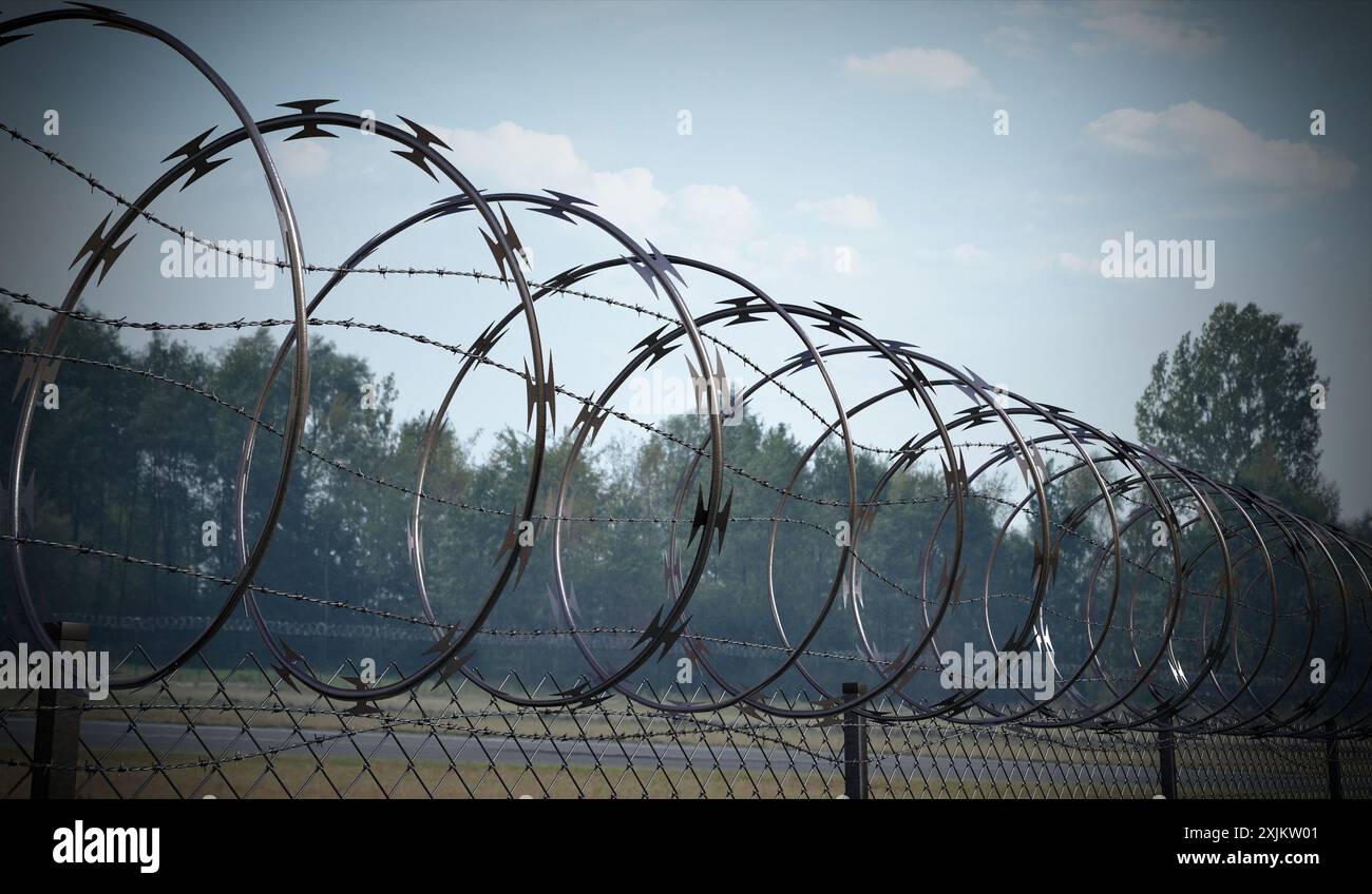 Spiral concertina barbed wire fence - 3d illustration Stock Photo - Alamy