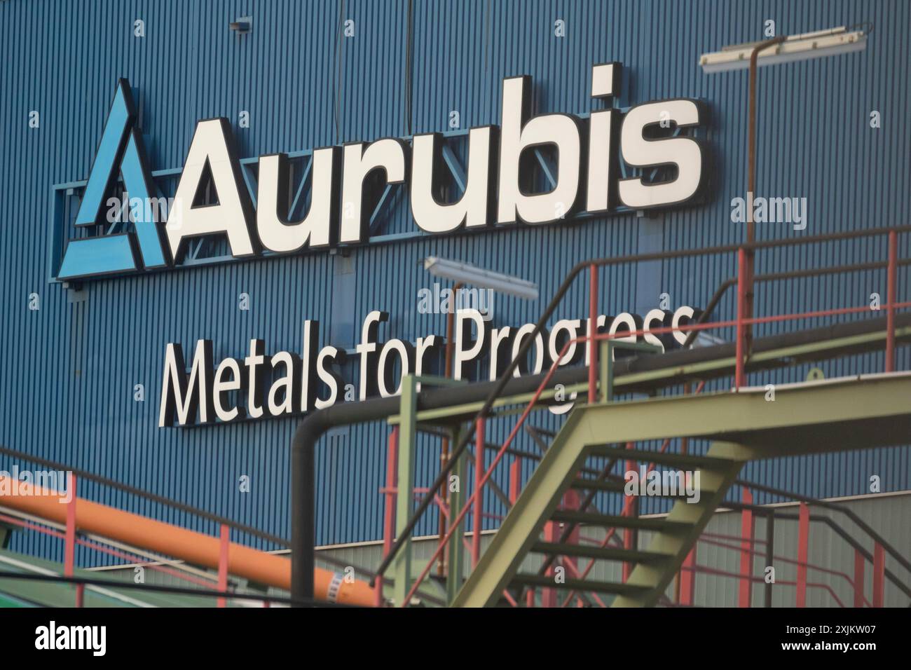 Logo and lettering Aurubis Metal for Progress on a factory building at the Aurubis AG plant ...