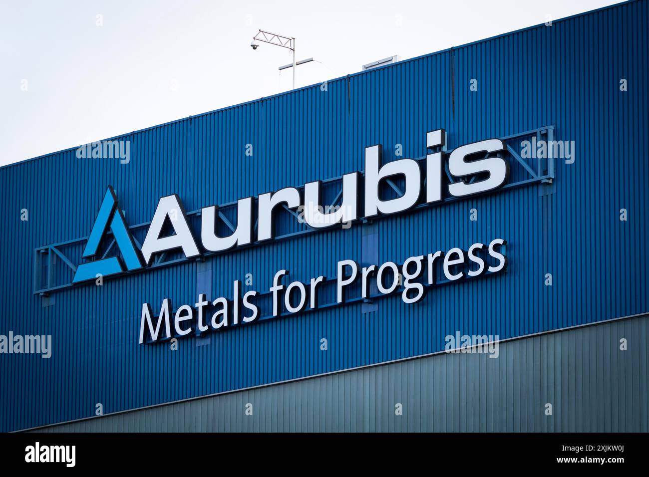 Logo and lettering Aurubis Metal for Progress on a factory building at the Aurubis AG plant ...