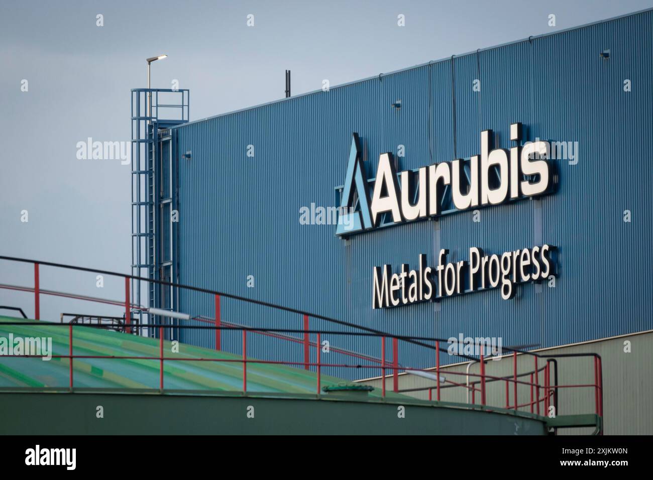 Logo and lettering Aurubis Metal for Progress on a factory building at the Aurubis AG plant ...