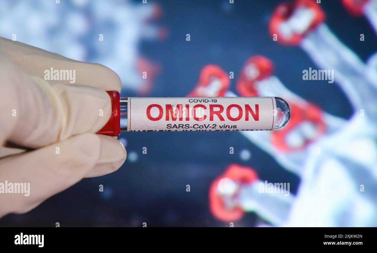 In this photo illustration, a person wearing gloves holding test sample ...