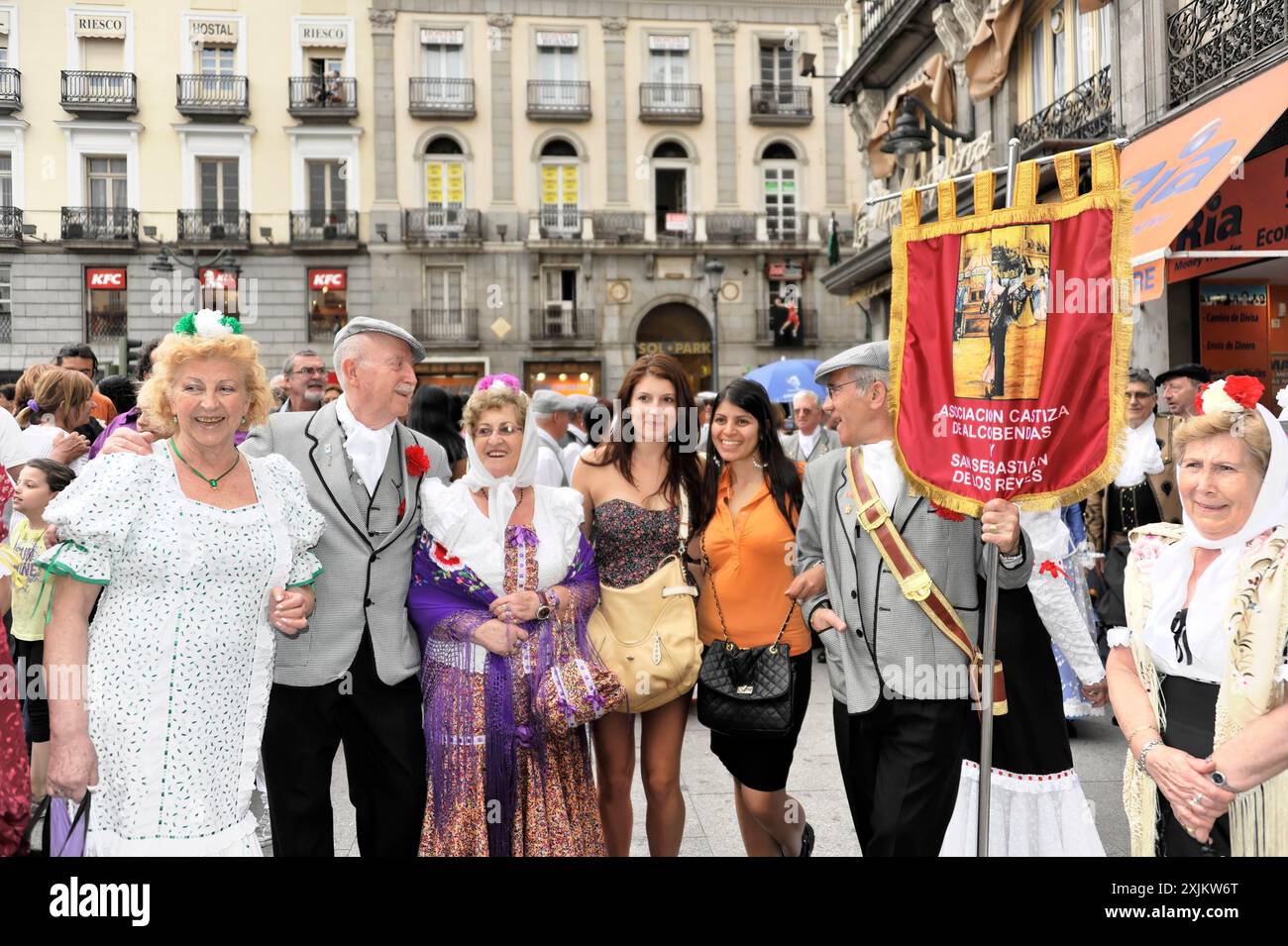 Madrid, Spain, Europe, A group of people in traditional dress happily ...