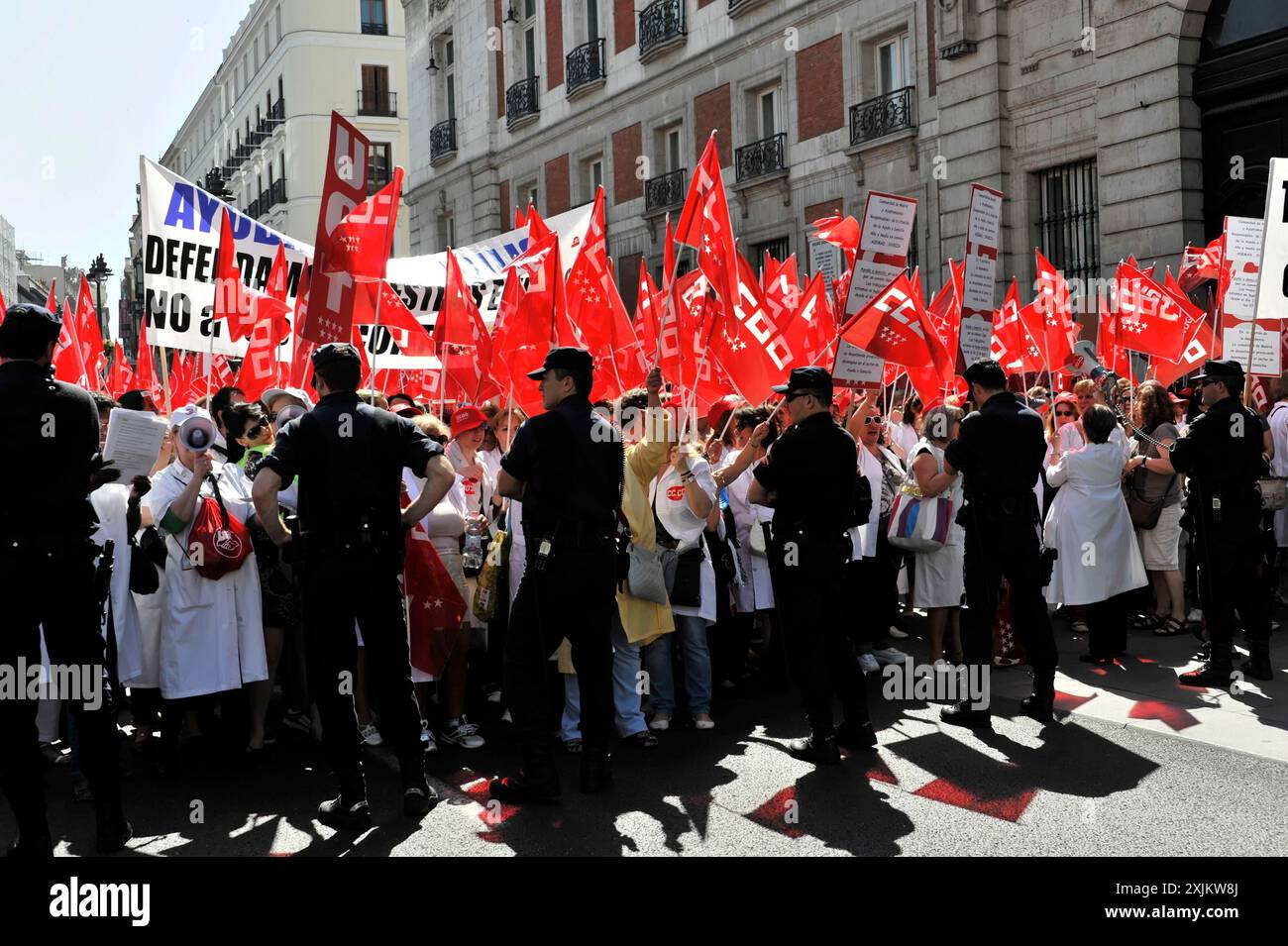 Madrid, Spain, Europe, Police officers monitor a large demonstration of ...