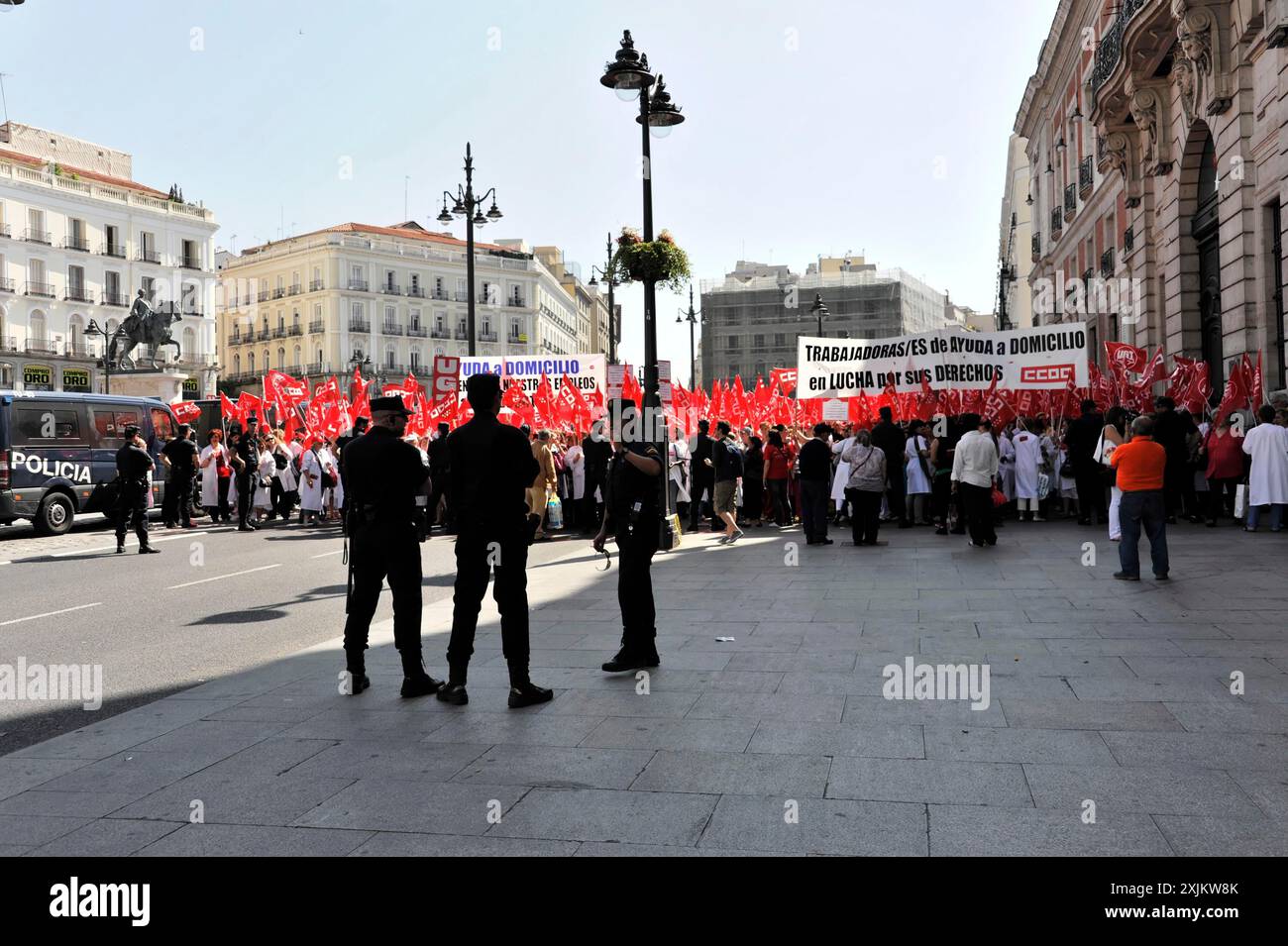 Madrid, Spain, Europe, A large crowd demonstrates on a wide street ...