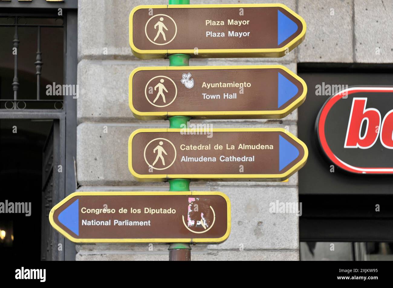 Madrid, Spain, Europe, Brown street signs point out various sights in ...