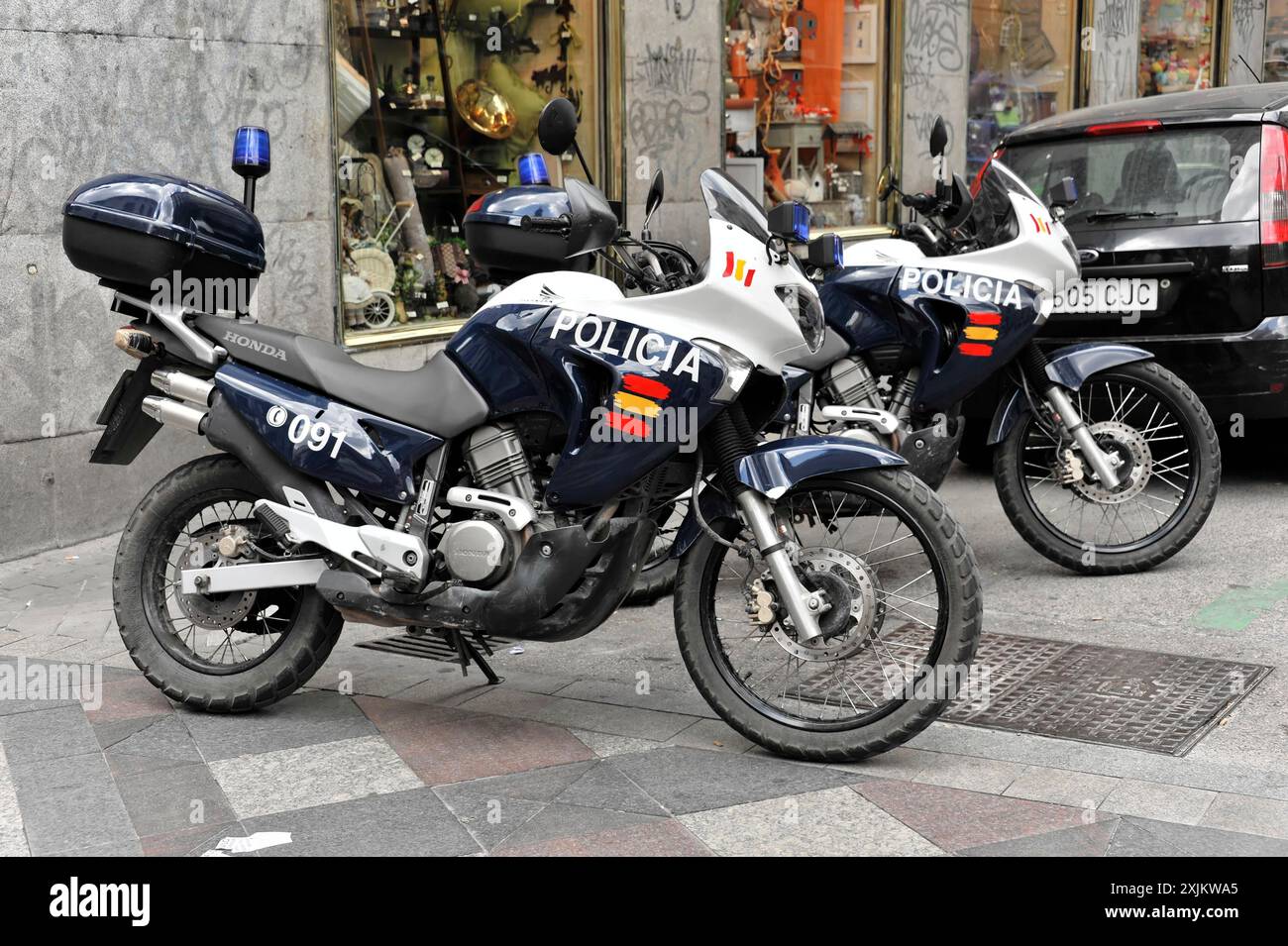 Madrid, Spain, Europe, Two police motorbikes parked side by side on a ...