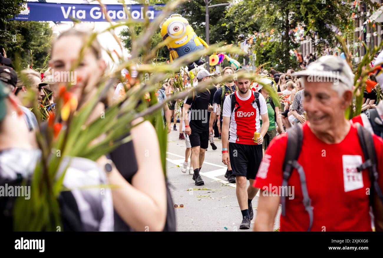 NIJMEGEN - 19/07/2024 Walkers walk across the finish line at the Via ...
